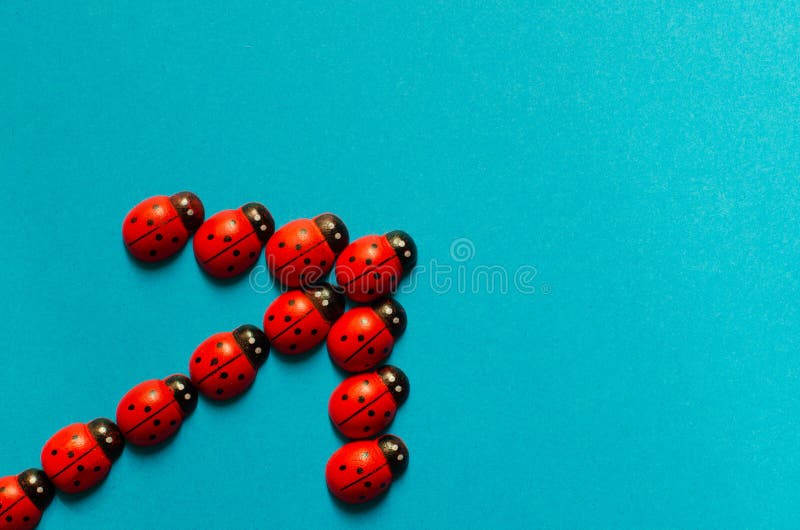 Decorative Wooden Ladybugs on Blue Background with Copy Space. Ladybug ...