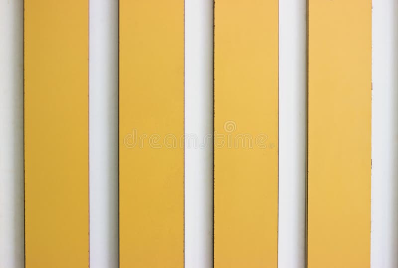 Decorative Yellow and White Stripe Panels on the Wall Stock ...