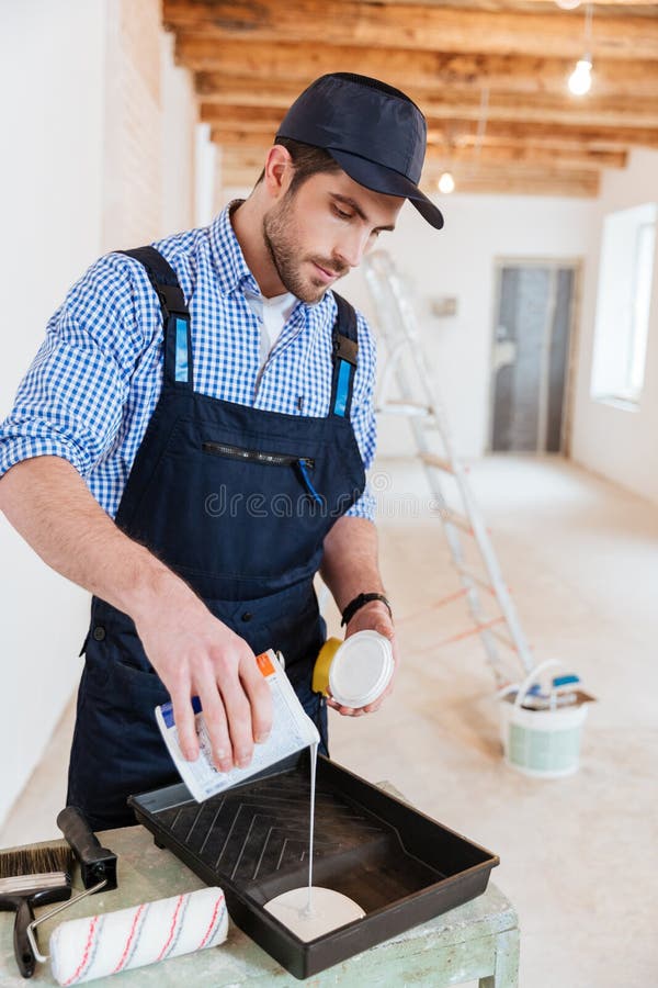 Decorator Preparing To Paint Something Indoors Stock Image - Image of ...