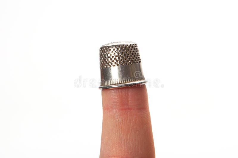 Dedal En El Dedo Medio, Primer Foto de archivo - Imagen de mano, arte ...