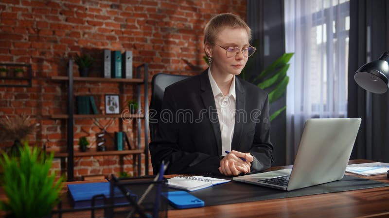 Focused Professional Writing Notes in Modern Office Stock Photo - Image ...