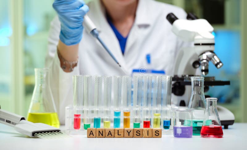 A Scientist is Conducting a Detailed Chemical Analysis in a Modern ...