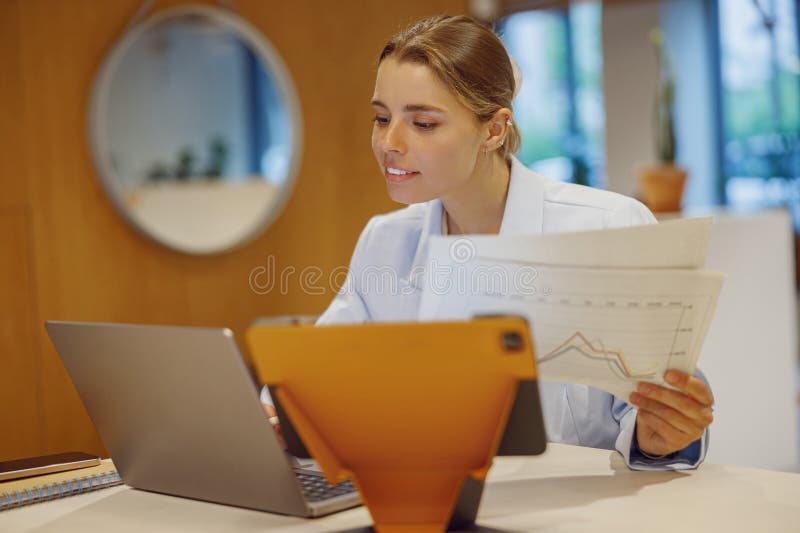 Dedicated Professional Expert Engaged in Analyzing Data within a ...