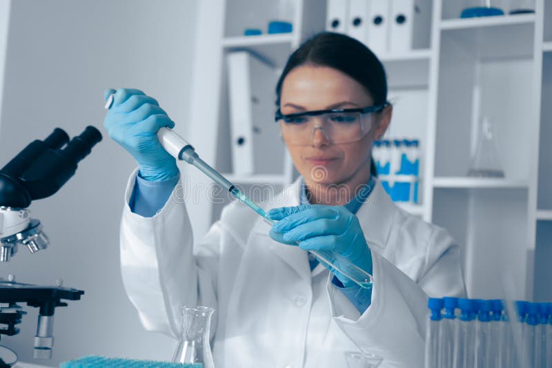 A Dedicated Scientist Conducts Complex Biochemistry and Chemistry ...