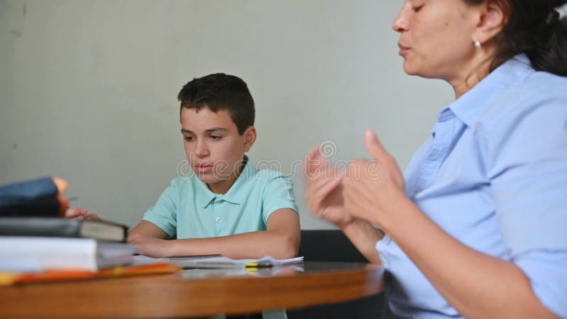 Dedicated Student and Teacher Duo Engaged in Focused Learning Session ...