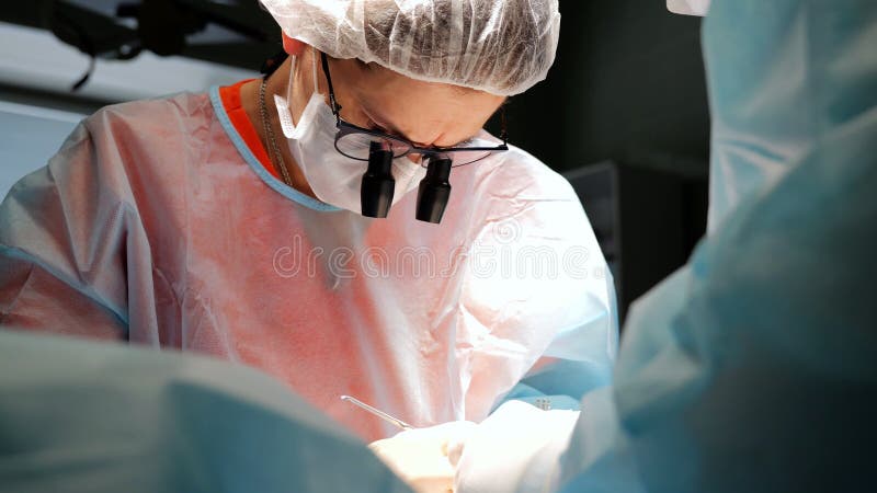 Dedicated Surgeon in Operating Room Performs Life-saving Operation on ...