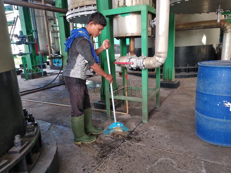 A Dedicated Worker Sweeping Dirt Editorial Stock Image - Image of ...
