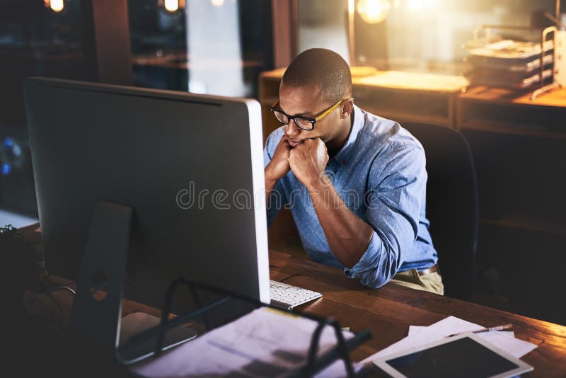 Dedication Doesnt Have a Knock Off Time. a Handsome Young Businessman ...