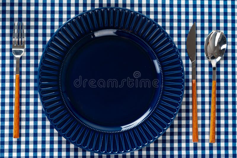 Deep Blue Ceramic Plate with Cutlery Close Up Stock Image - Image of ...