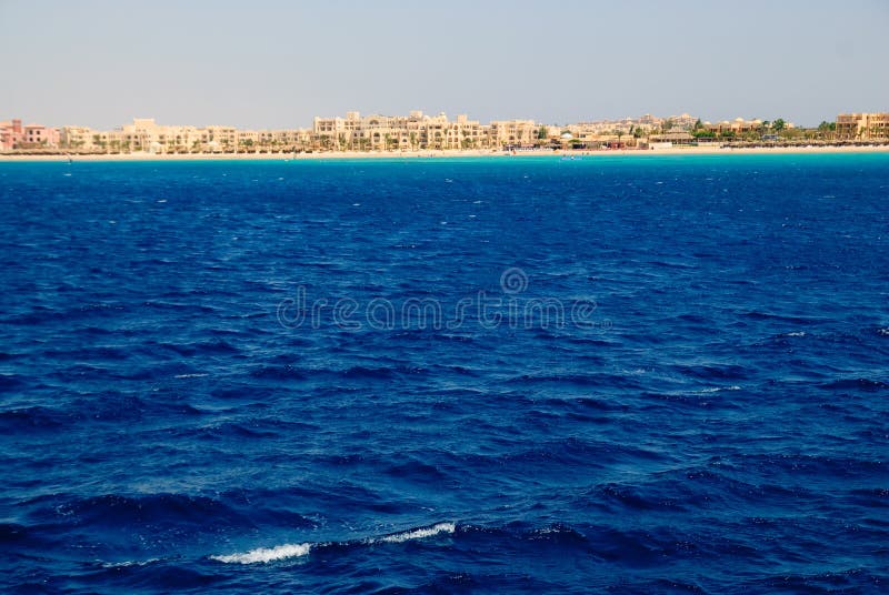 Deep Blue Sea with Yellow Coastline Stock Image - Image of egypt, water ...