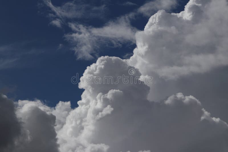 Deep Blue Summer Sky with Epic White Cumulus Clouds Stock Photo - Image ...