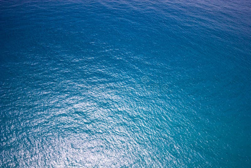 Deep blue water stock image. Image of sunshine, crystal - 140575345