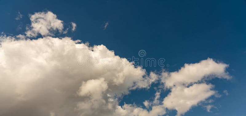 Deep Bright Blue Sky with Large White Clouds As Background Stock Photo ...