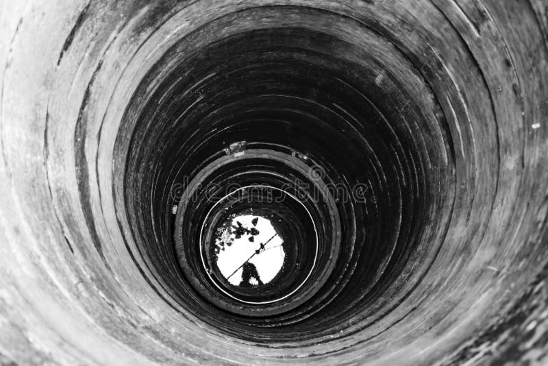 Deep dark underground well stock photo. Image of control - 117818586