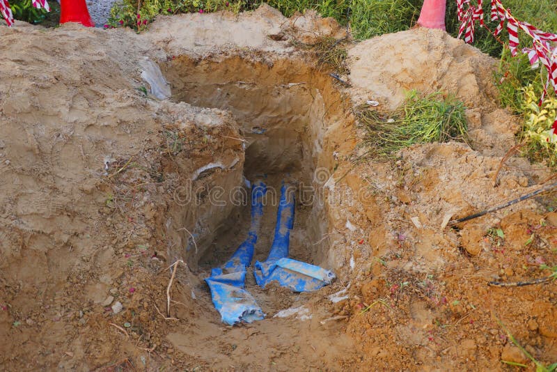 Deep Excavation Near the Foot Path, Part of Construction Work Stock ...
