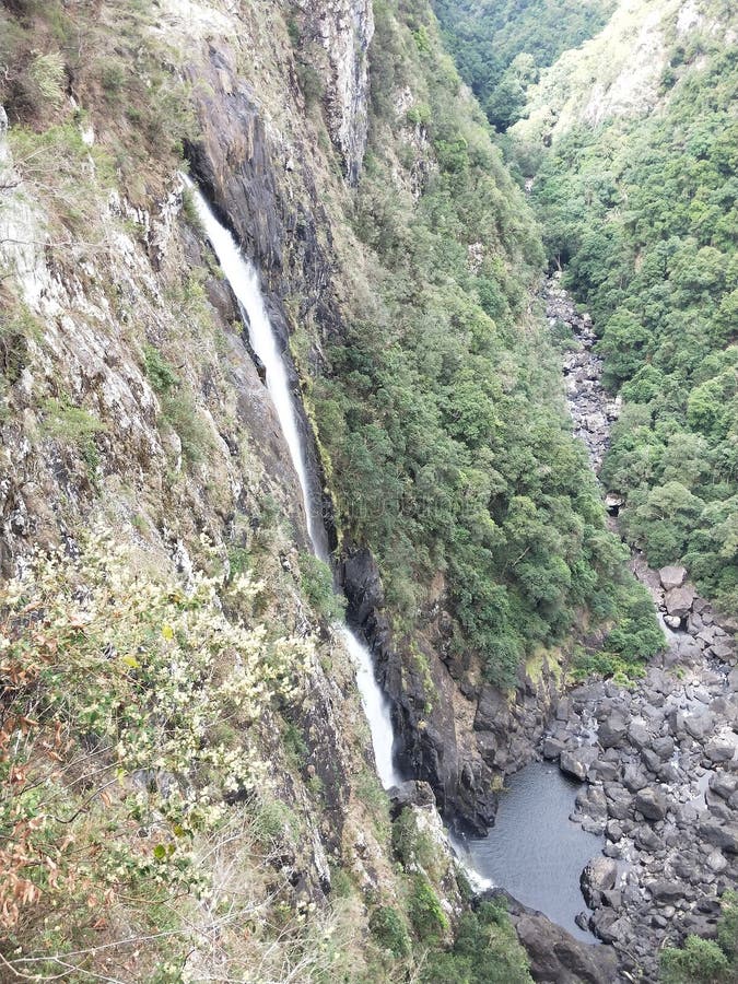 Deep Fall on a Rocky Mountain with Rocks on the Background Stock Photo ...