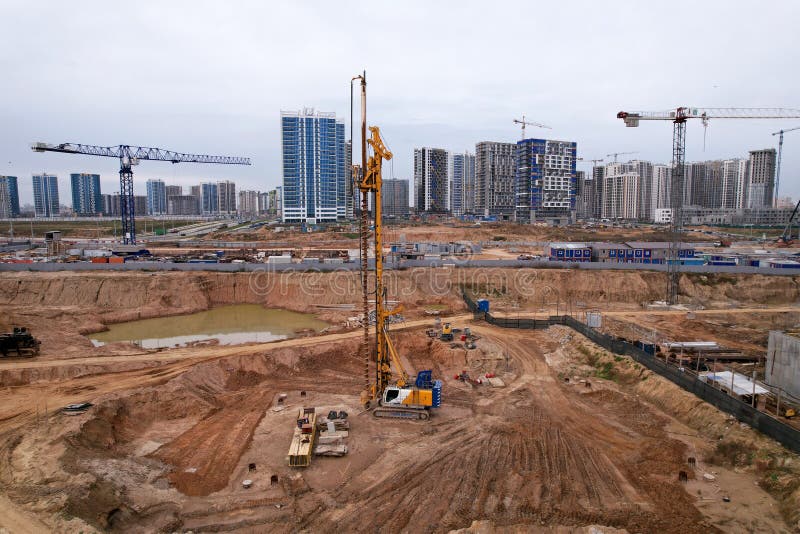 Drilling Rig and Pile Driver at Construction Site. Deep Foundation ...