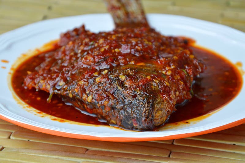 Deep Fried Black Mango Fish Dressing Chili Sauce on Dish Stock Image ...