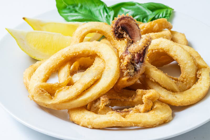 Deep Fried Calamari Rings on Plate Stock Image - Image of spinach ...