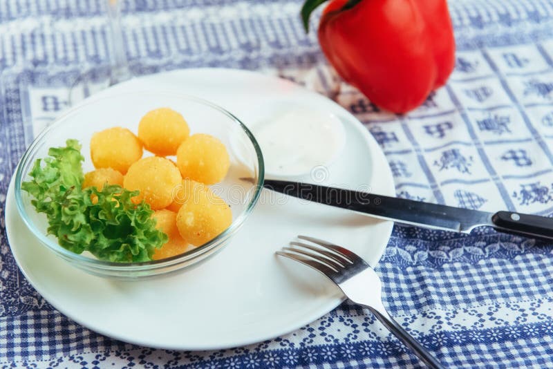 Deep Fried Cheese Balls with Lettuce and Sauce Stock Photo - Image of ...