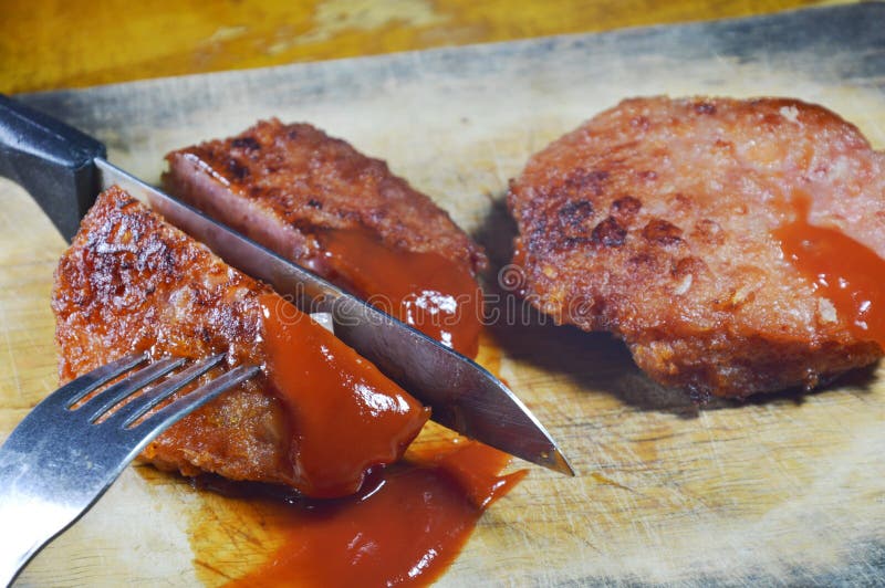 Deep Fried Chop Pork Dressing Ketchup and Slice on Chopping Block Stock ...