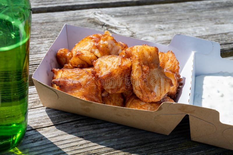 Deep Fried Cod Fish in Pieces Served Outdoor with Tartar Sauce Stock ...