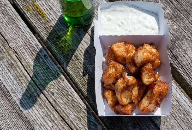 Deep Fried Cod Fish in Pieces Served Outdoor with Tartar Sauce Stock ...