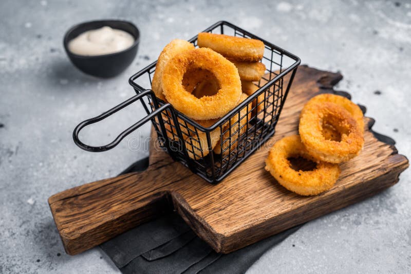 Deep Fried Crunchy Onion Rings, Delicious Snack. Grey Background Stock ...