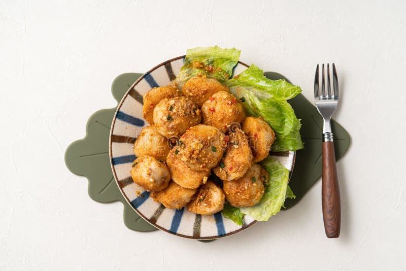 Deep Fried Cuttlefish Ball with Salted Egg Yolk Coating Stock Photo ...