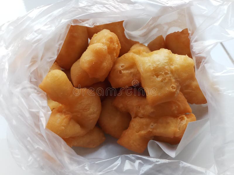 Deep-fried Dough Stick in Plastic Bag Stock Image - Image of oily ...