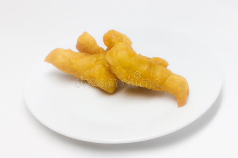 Deep-fried dough stick stock image. Image of food, served - 31912339