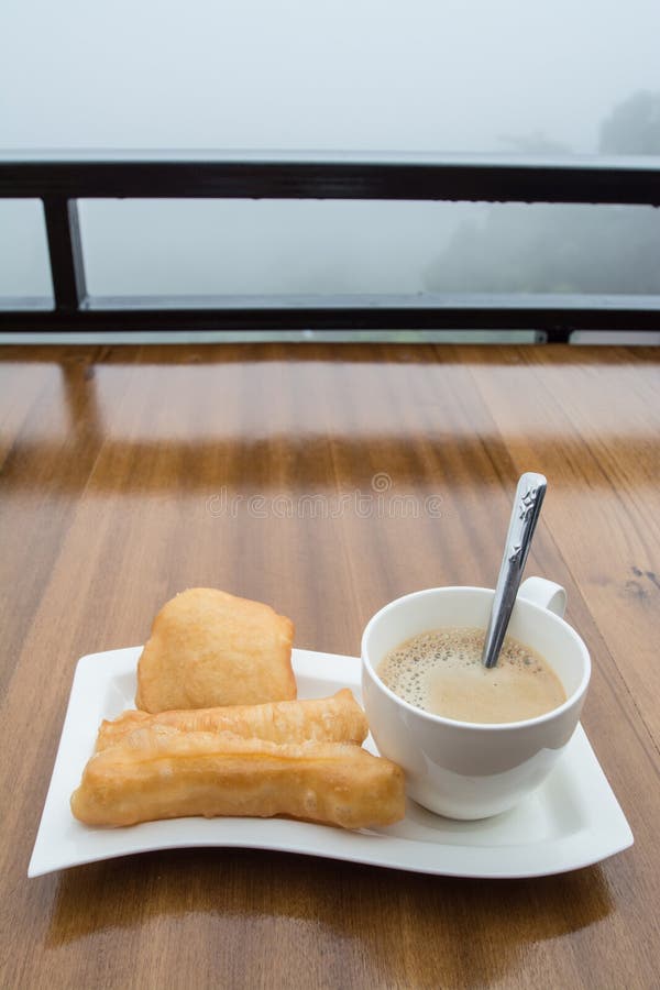 Deep-fried Doughstick and Coffee ,Thai Breakfast Stock Image - Image of ...