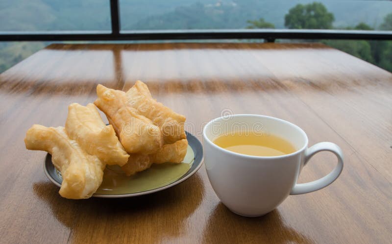 Deep-fried Doughstick and Tea ,Thai Breakfast Stock Image - Image of ...