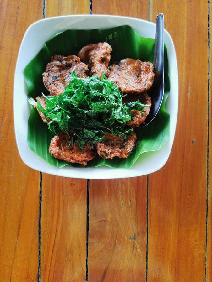 Deep Fried Fish Cake with Fried Holy Basil Stock Image - Image of ...