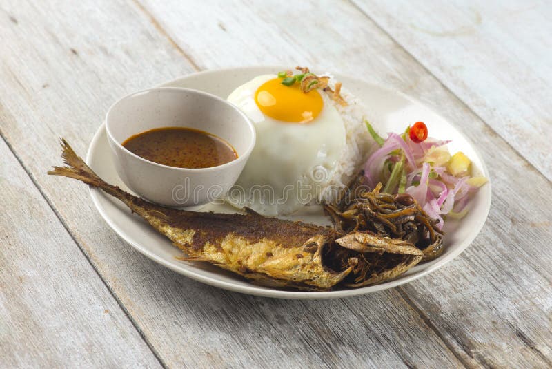 Fried Fish with Rice with Spices and Curry Stock Image - Image of ...