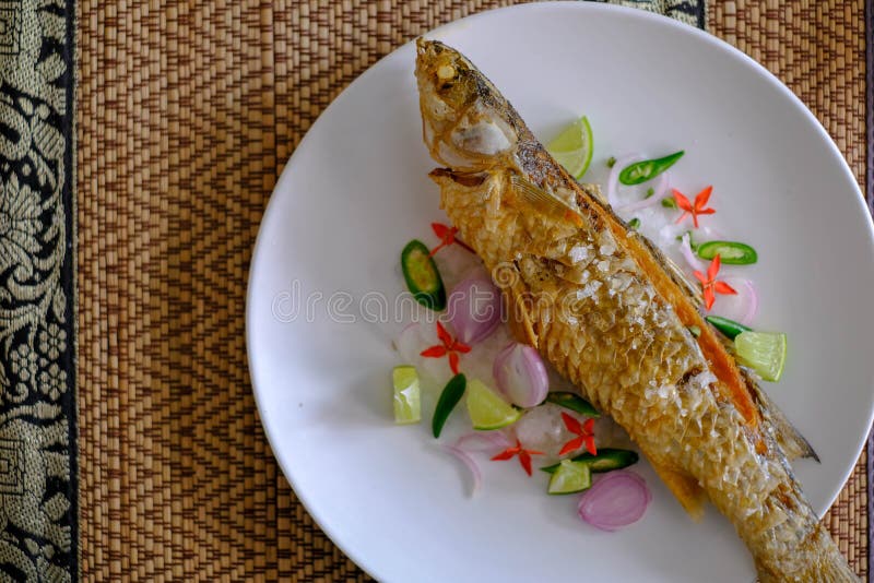 Elegant Deep Fried Fish With Herb And Flower Fine Dining Stock Photo ...