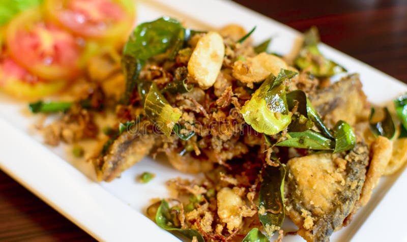 Deep Fried Fish with Thai Herbs Stock Photo - Image of fish, food: 45808192