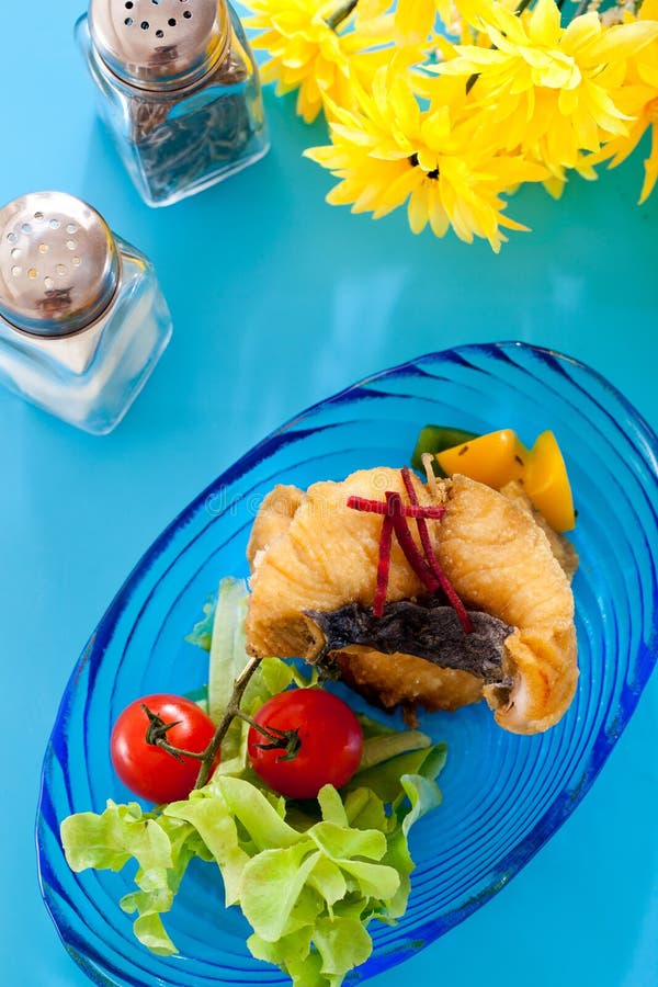 Fried fish on table stock photo. Image of deep, restaurant - 121551590