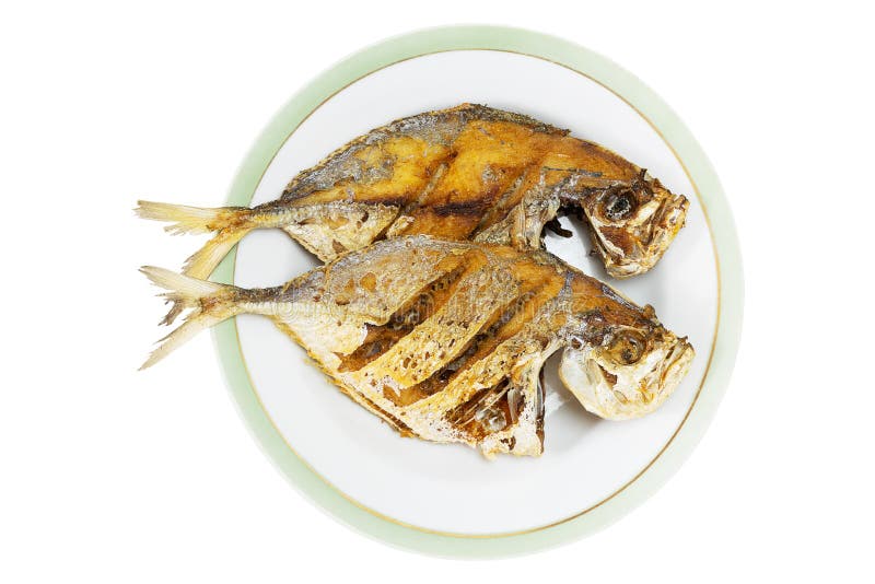 Deep Fried Fishes on Plate on White Table with Clipping Path Stock ...