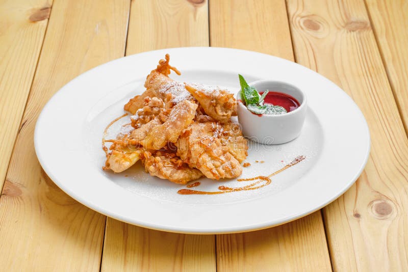 Deep Fried Fruits in Breading Served with Caramel and Strawberry Jam ...