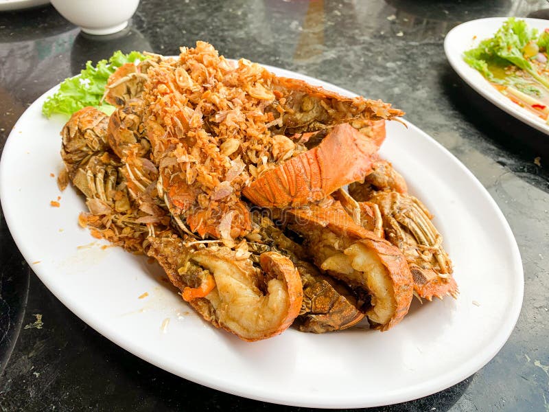 Deep Fried Mantis Shrimp with Garlic and Pepper in White Plate Stock ...