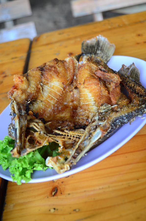 Deep-Fried Marinated Snapper with Sweet Fish Sauce Stock Image - Image ...