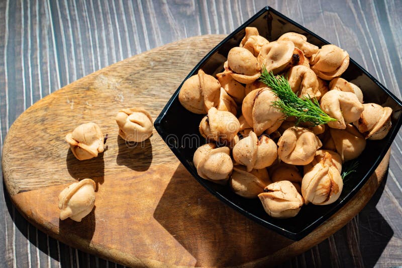 Deep Fried Meat Dumplings in Plate with Greens Stock Image - Image of ...
