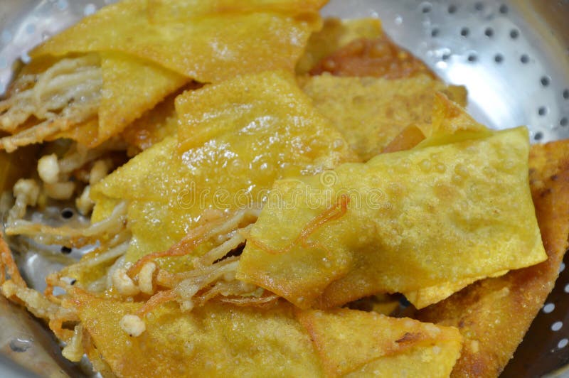 Deep Fried Needle Mushroom Wrap in Dumpling Flour on Sieve Stock Image ...