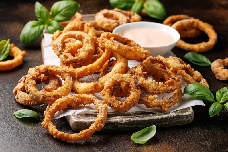 Deep Fried Onion Rings on Wooden Board with Sauce Stock Photo - Image ...
