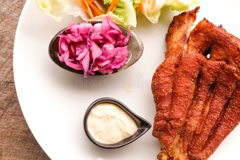 Deep Fried Pork Knuckle on Wooden Table Stock Image - Image of baked ...