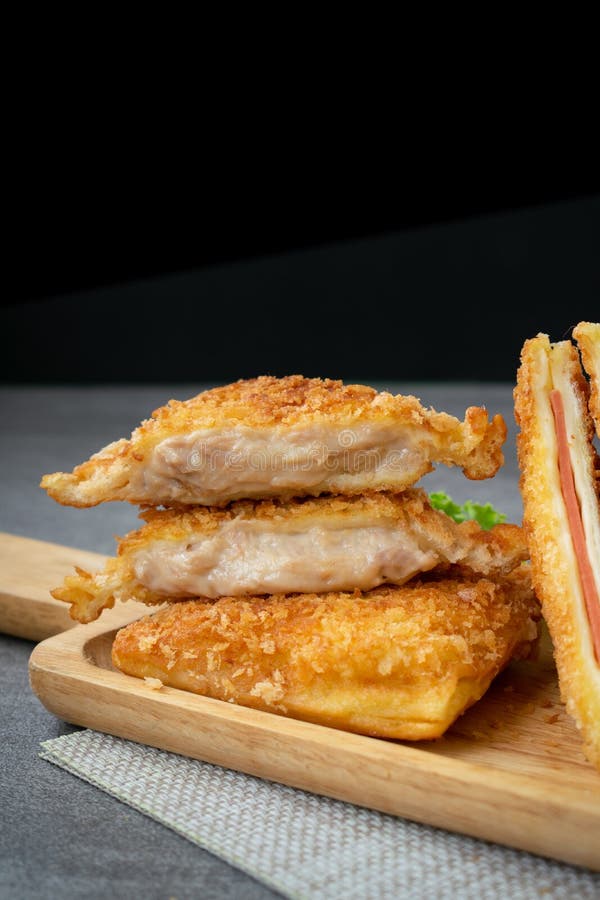 Deep Fried Sandwich Stuffed Tuna in Wooden Dish on Table Stock Photo ...