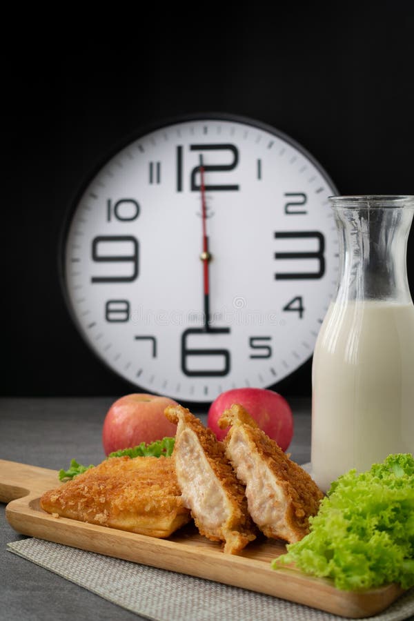Deep Fried Sandwich Stuffed Tuna in Wooden Dish on Table and Clock ...