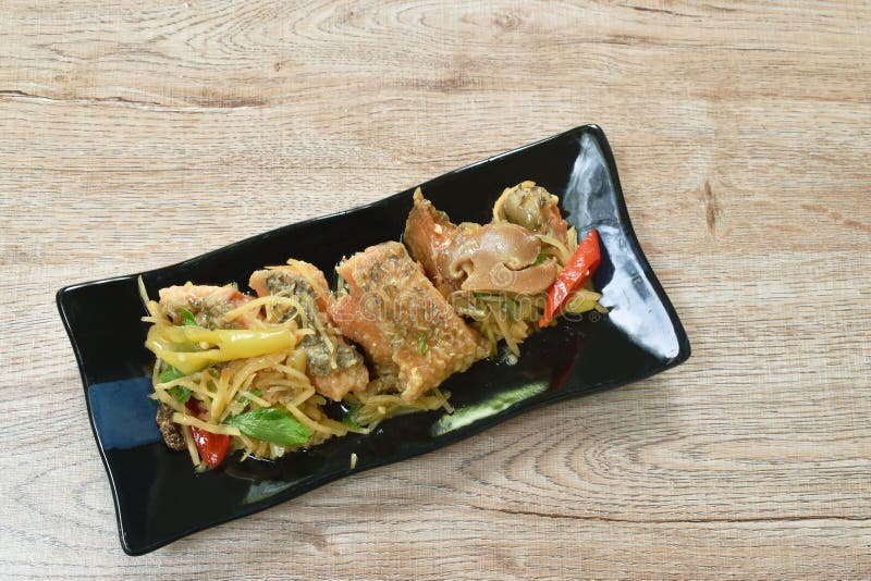Deep Fried Slice Striped Snake Head Fish with Ginger and Celery on Dish ...