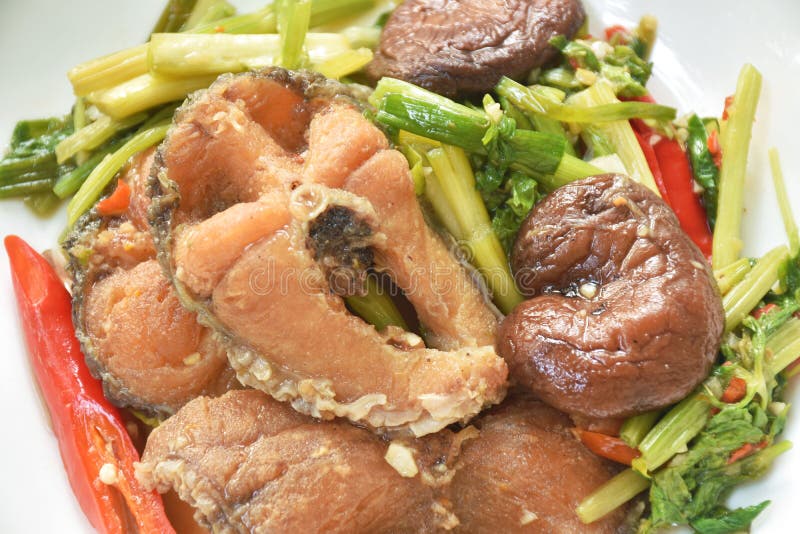 Deep Fried Slice Striped Snake Head Fish with Ginger and Celery on ...